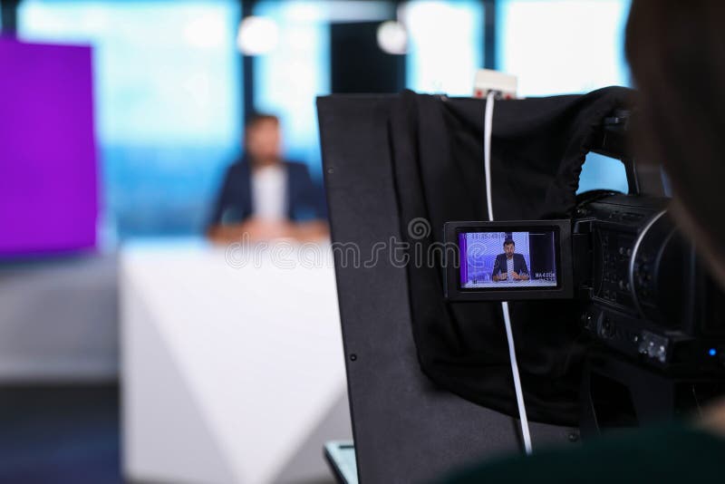 Presenter and Video Camera Operator Working. News Broadcasting Stock ...