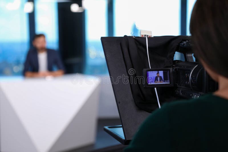 Presenter and Video Camera Operator Working. News Broadcasting Stock ...