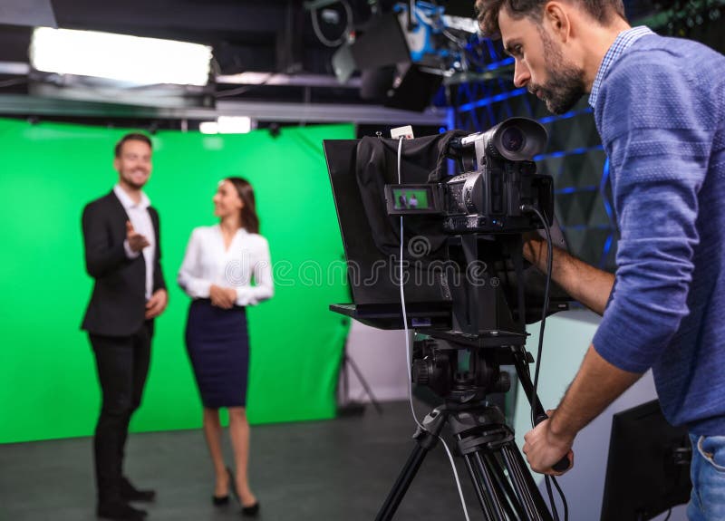 Presenters and Video Camera Operator Working. News Broadcasting Stock ...