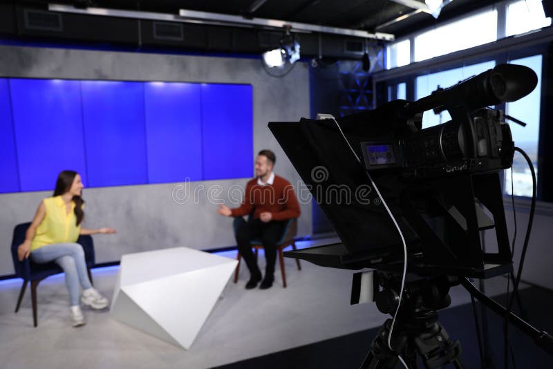 Presenters Working in Studio, Focus on Camera Stock Photo - Image of ...