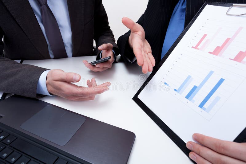 Presenting Financial Data on Business Meeting Stock Photo - Image of ...