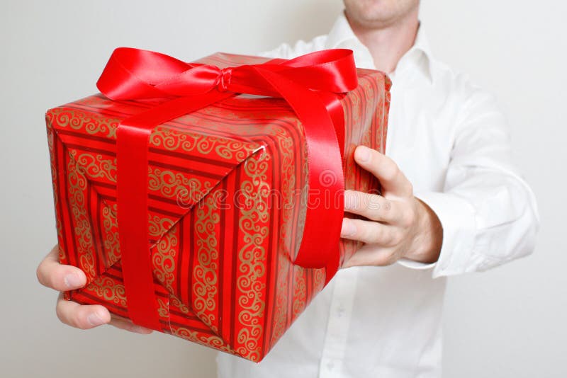 Presenting a gift stock photo. Image of deliver, shirt - 10891374