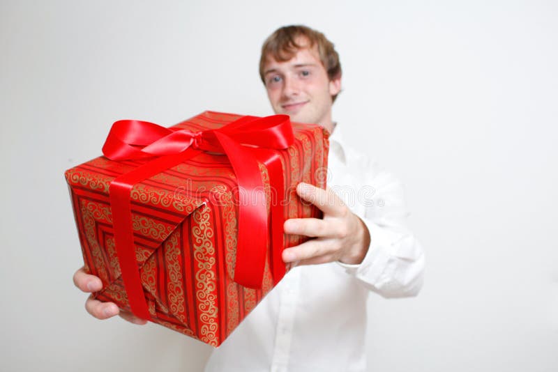 Presenting a gift stock photo. Image of studio, giving - 10891380
