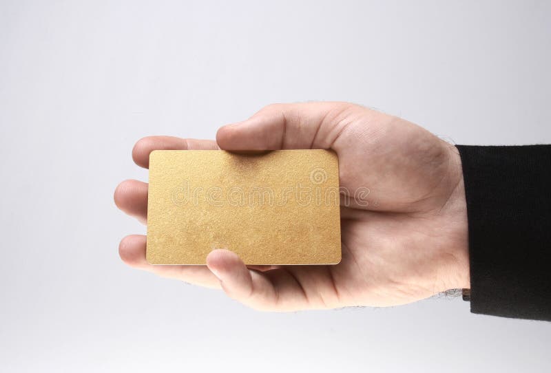 Presenting a golden card stock photo. Image of businessman - 7757930