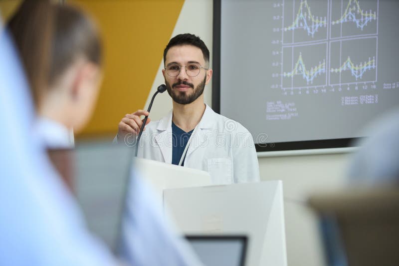 Engaging Speaker Presenting Conference Modern Setting Stock Photos ...