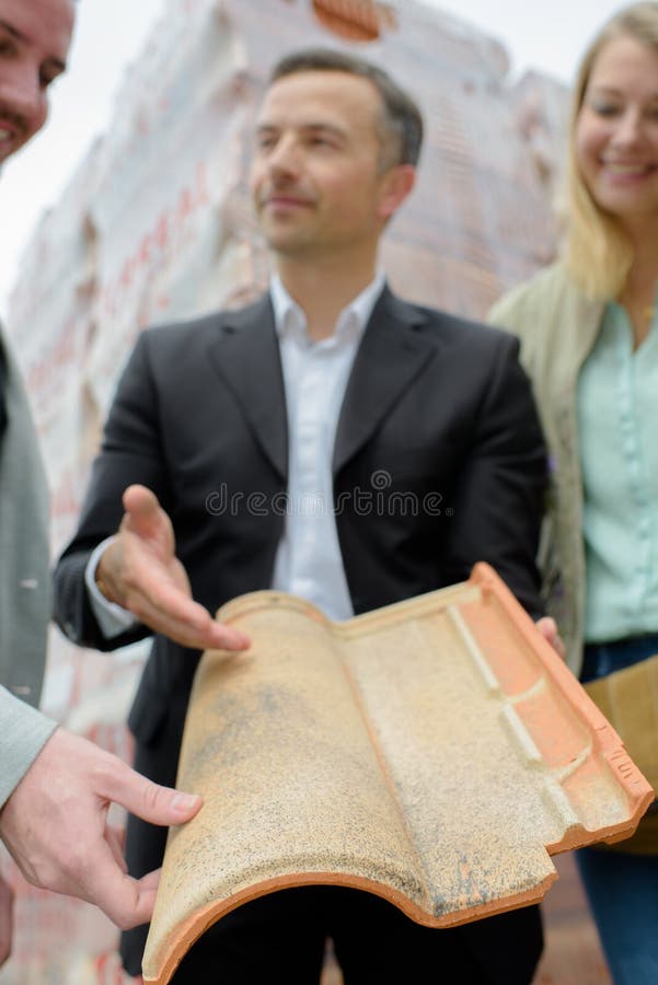Presenting a roof tile stock photo. Image of plan, transaction - 119529154