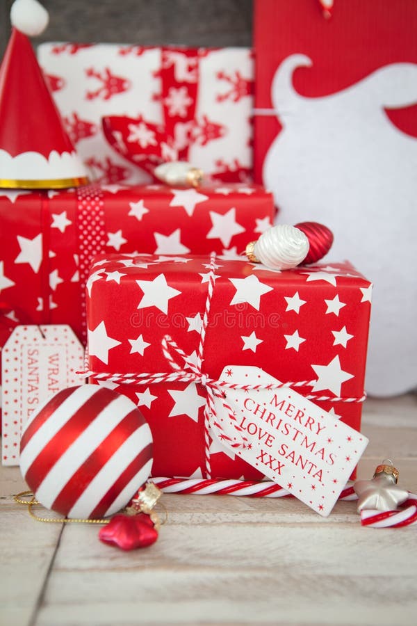 Presents in Red and White Wrapping Paper Stock Image - Image of ...