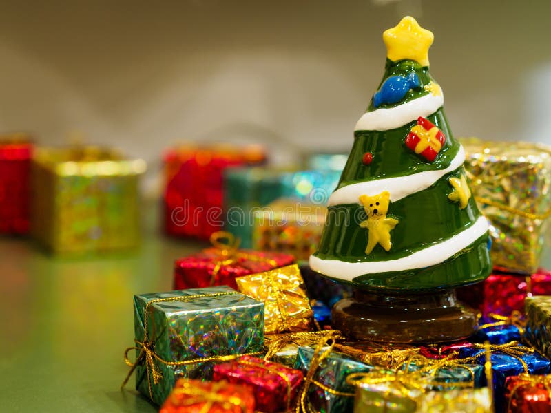 Presents Under a Toy Christmas Tree. Christmas Theme / Concept with ...
