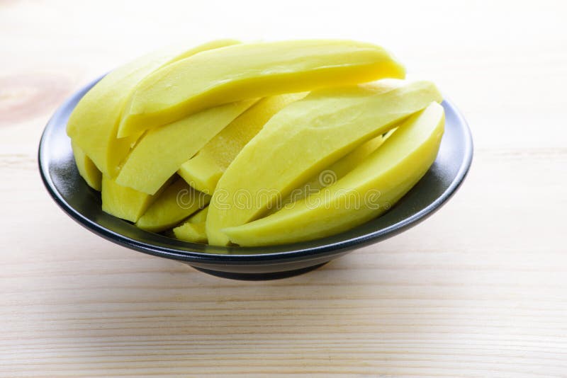 Preserved Mango Fruits in Black Bowl Stock Photo - Image of piece ...