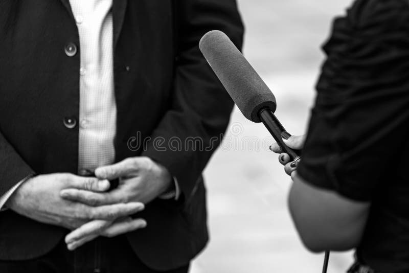 Press interview outdoors stock image. Image of speech - 269861731