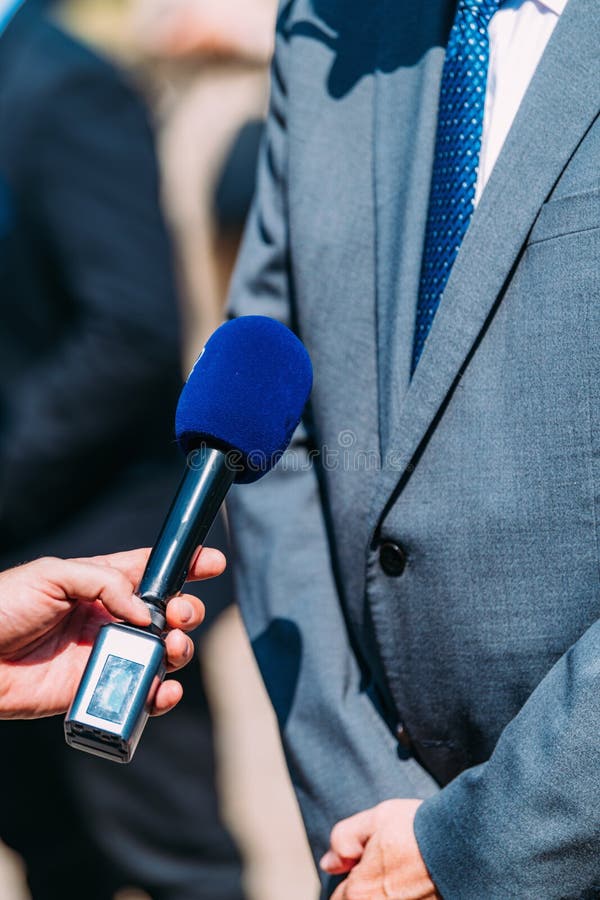 Press interview outdoors stock image. Image of speech - 269861731