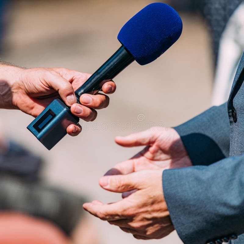 Press interview outdoors stock image. Image of speech - 269861731