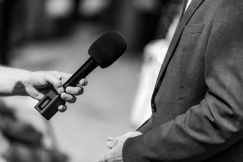 Press interview outdoors stock image. Image of speech - 269861731