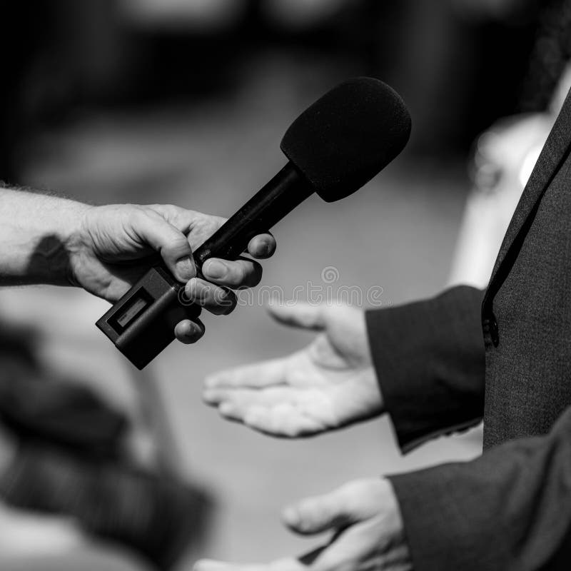 Press interview outdoors stock image. Image of speech - 269861731