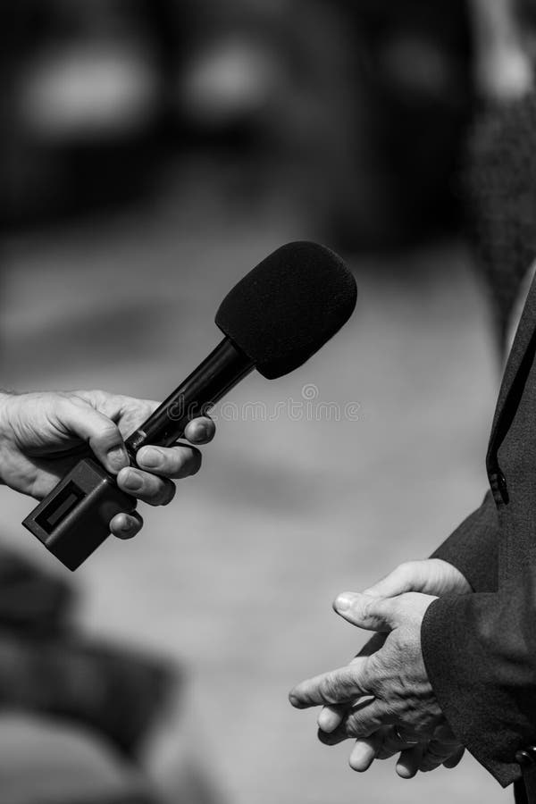 Press interview outdoors stock photo. Image of television - 269861784