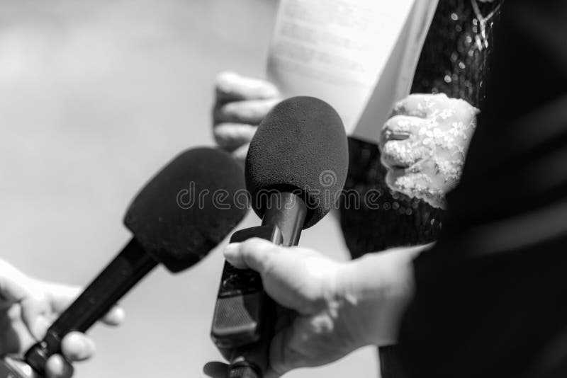 Press interview outdoors stock image. Image of speech - 269861731