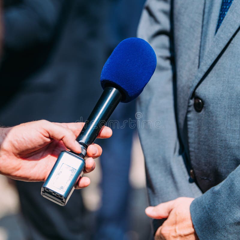 Press interview outdoors stock image. Image of speech - 269861731