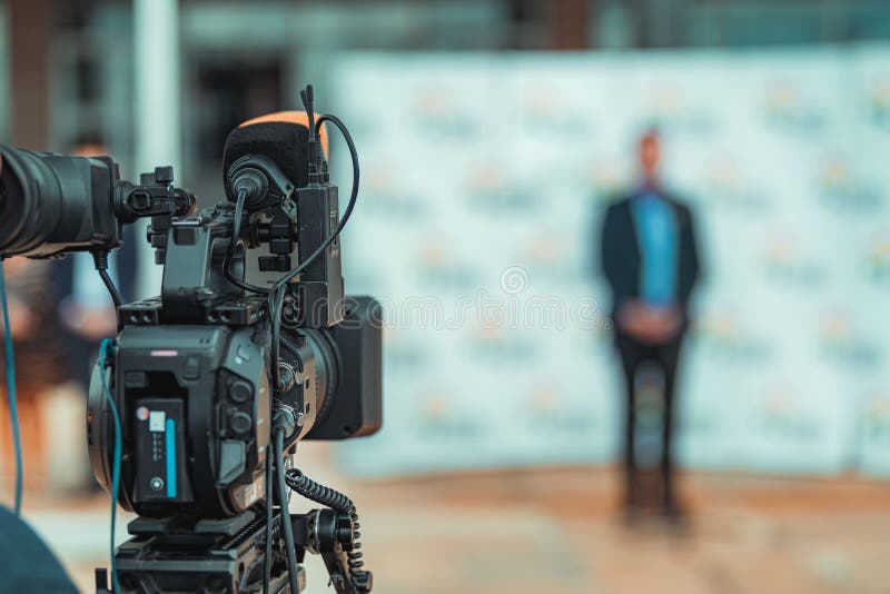 Press interview outdoors stock image. Image of speech - 269861731