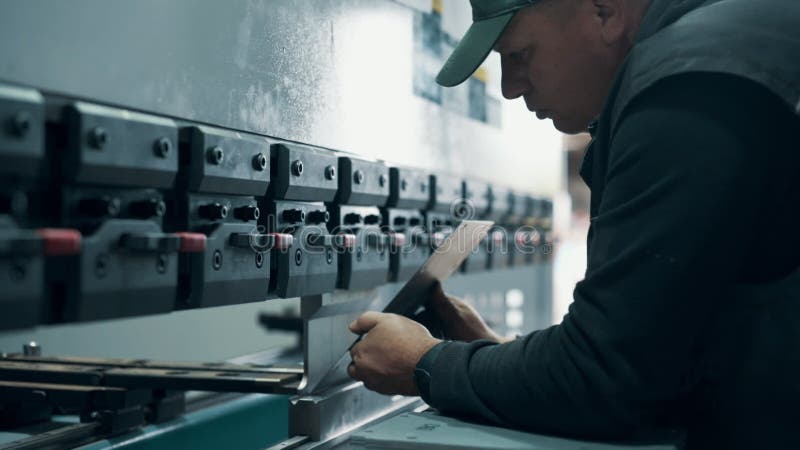 Press Operator Bending Sheet Metal. Stock Video - Video of mechanical ...