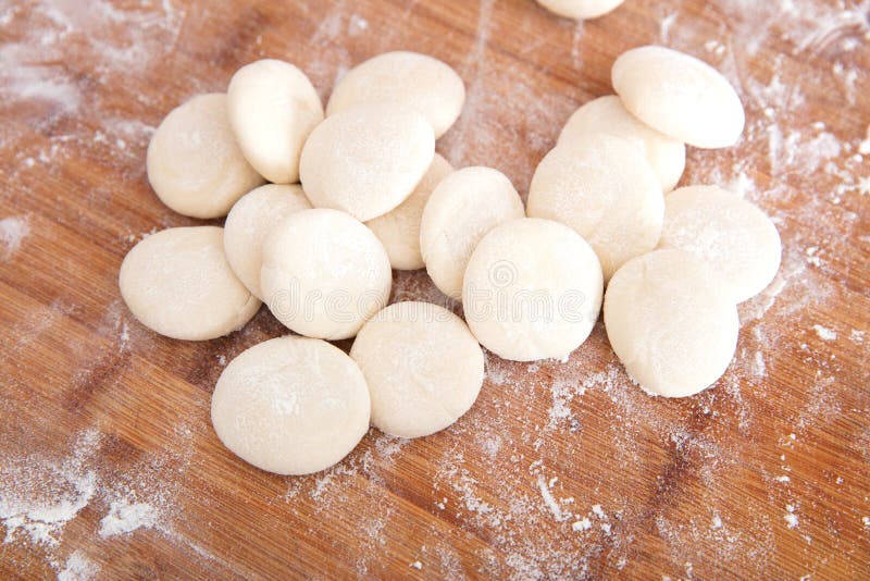 Pressed Small Dough on Chopping Board Stock Photo - Image of close ...