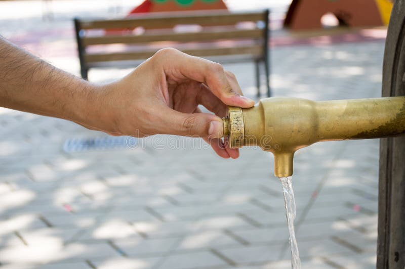 Pressing the Button of the Water Fountain Stock Photo - Image of ...