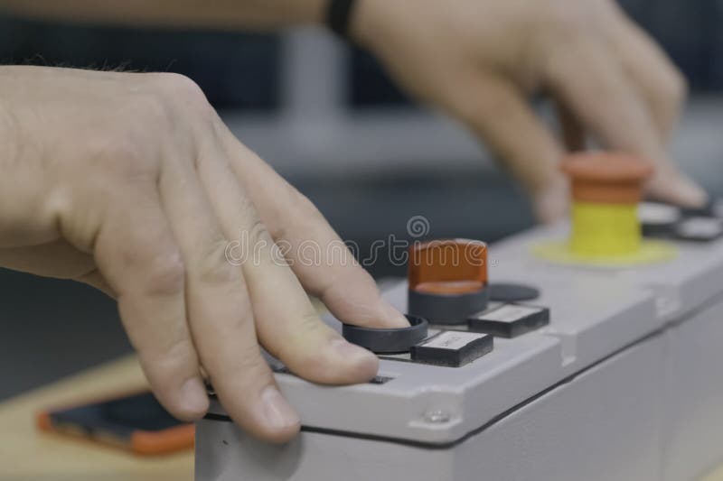 Pressing Buttons on the Machine Control Panel. Production Control ...