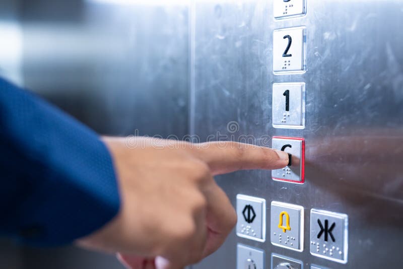 Pressing Elevator Button, Person in Business Attire Using Elevator in ...