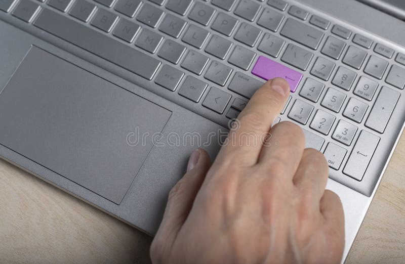 Pressing Enter Button on Laptops Keypad Stock Photo - Image of typing ...