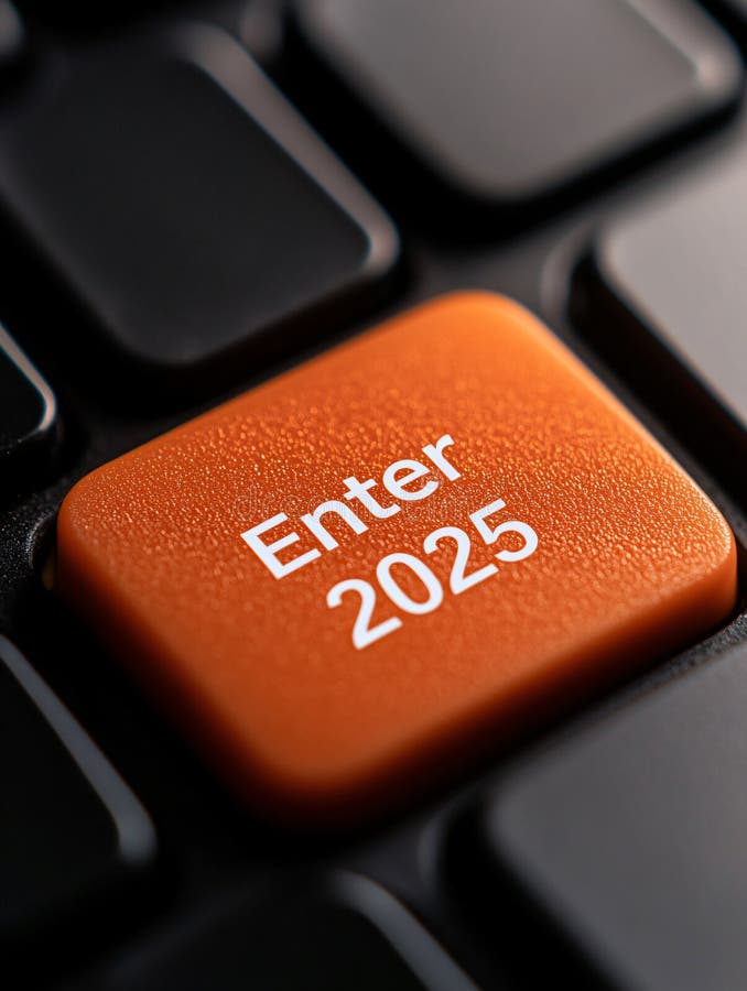 Pressing the Orange Enter Key Marked 2025 on a Dark Keyboard Creates a ...