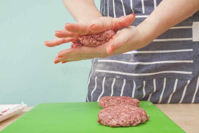 Pressing patties stock photo. Image of ground, organic - 10967224