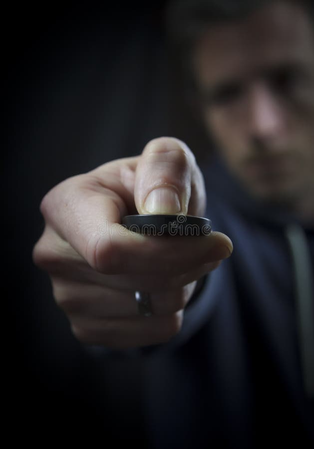 Pressing the remote stock photo. Image of remote, dark - 33699178