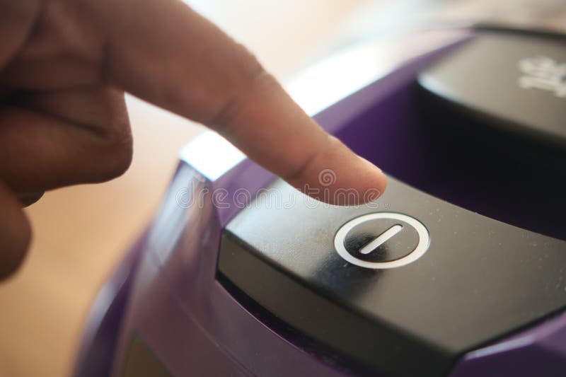Pressing Start Button on Vacuum Cleaner. Stock Photo - Image of home ...