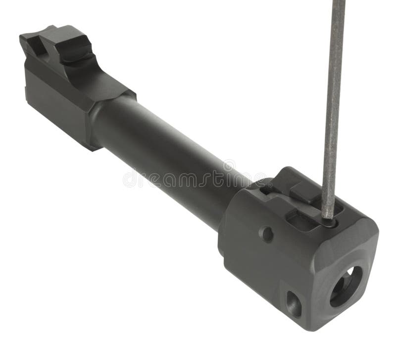 Self Indexing Muzzle Brake Going Onto a Handgun Barrel Stock Photo ...