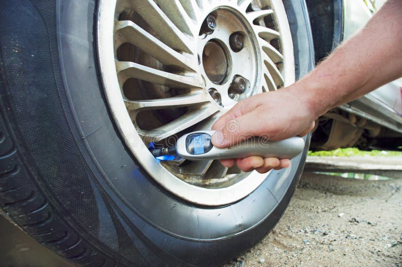 Pressure check in a wheel stock photo. Image of connect - 15401854