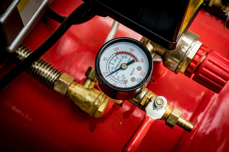 Pressure gage on red tank stock photo. Image of hydraulic - 90382040