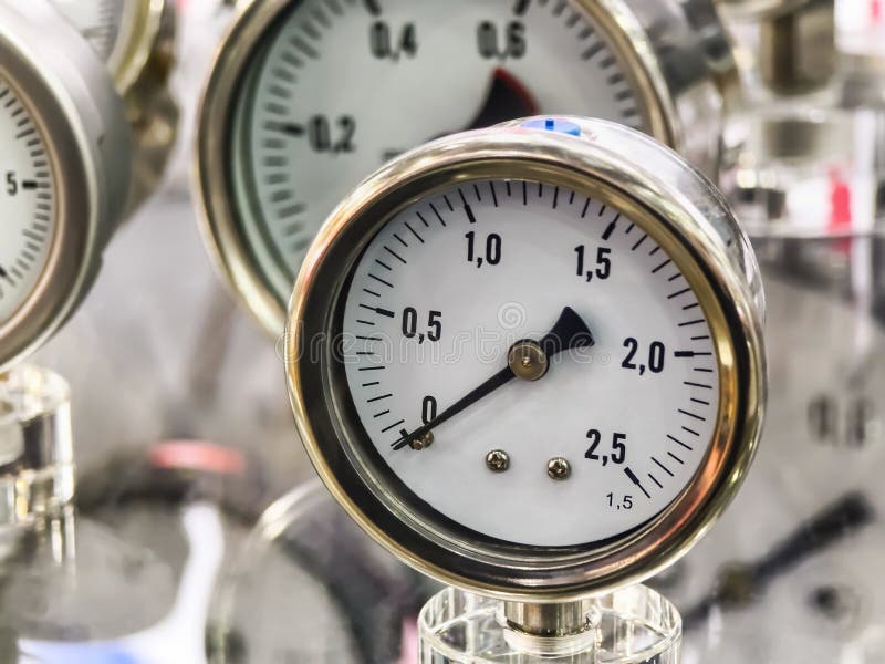 Pressure Gauges Displayed in a Factory Setting Showcasing Various ...