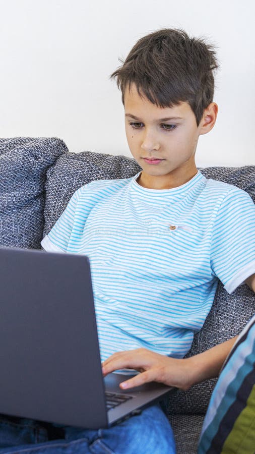 Preteen Boy Using Laptop Computer at Home. Technology, Online Learning ...