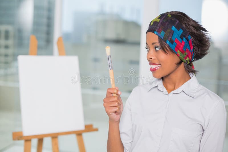 Pretty Artist Looking at Her Brush Stock Photo - Image of creativity ...