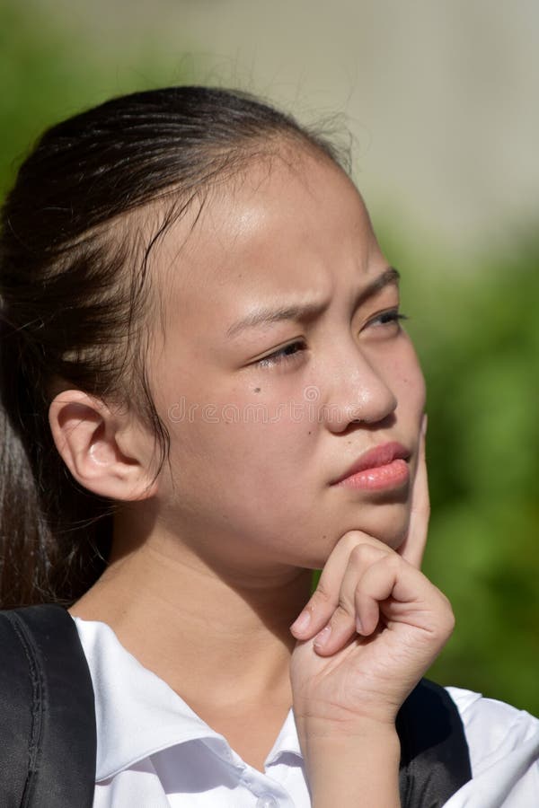 A Pretty Asian Female Student Wondering Stock Image - Image of ...