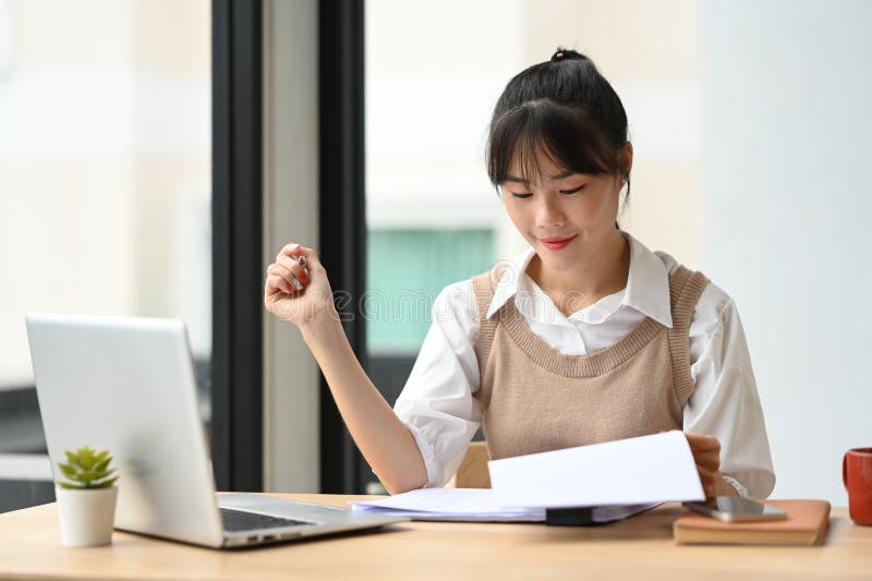 Pretty Asian Female University Student Using Laptop Computer and Doing ...
