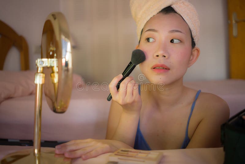 Pretty Asian Woman Cleaning Her Face Lifestyle Portrait Of Young