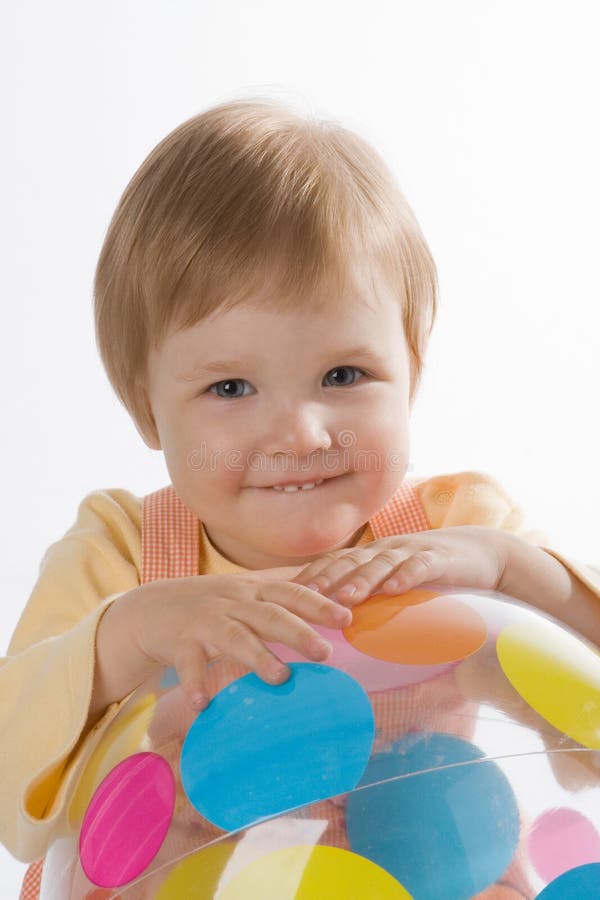 Pretty baby with ball stock image. Image of close, ears - 2665009