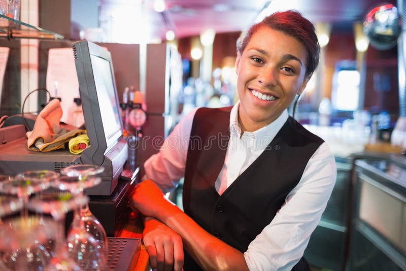 Pretty Barmaid Smiling at Camera Stock Photo - Image of waistcoat ...