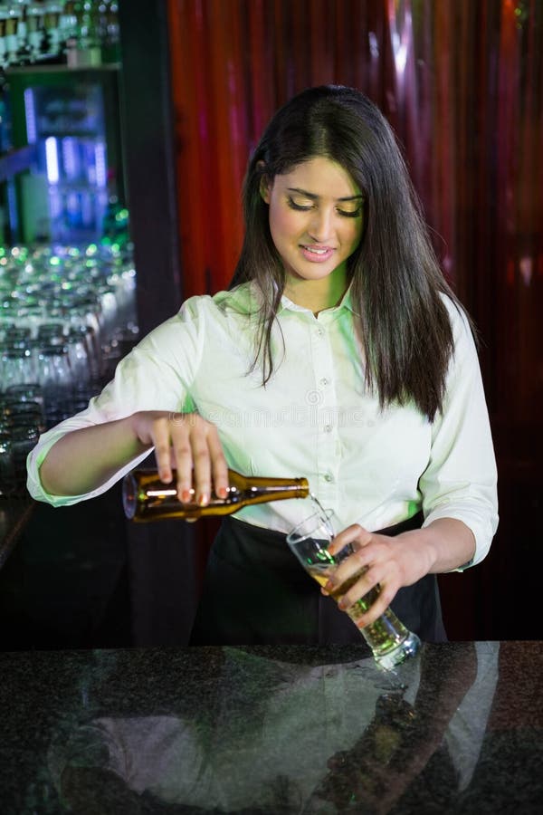 Pretty Bartender Preparing a Drink at Bar Counter Stock Image - Image of bottle, attractive ...