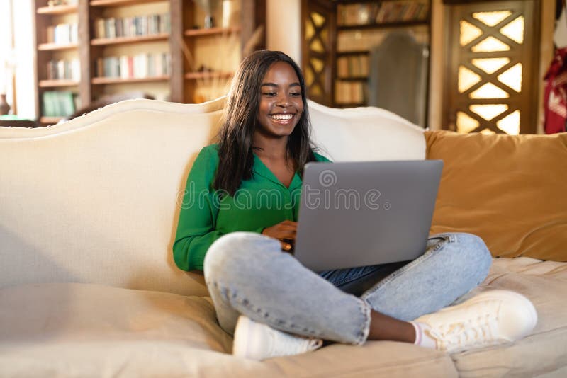 Pretty Black Lady Using Laptop Computer for Online Work, Education or ...