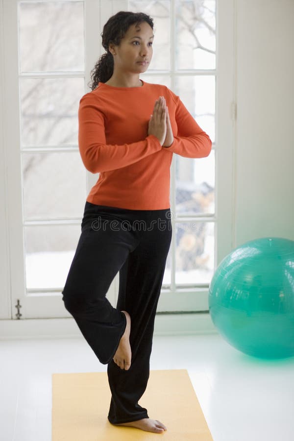 Pretty Black Woman Practicing Yoga Stock Photo - Image of body, hands ...