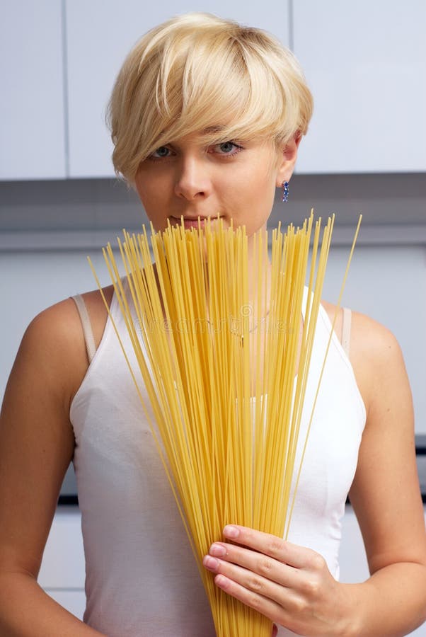 Pretty Blond Girl in the Kitchen Making Pasta Stock Photo - Image of ...