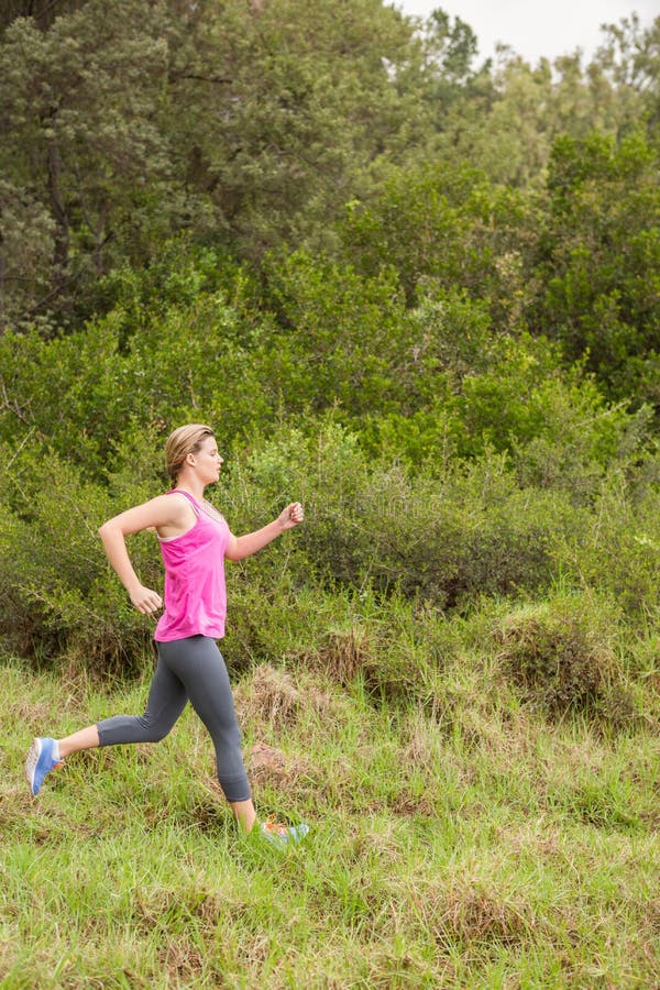 Pretty Blonde Athlete Jogging Stock Photo - Image of activity ...