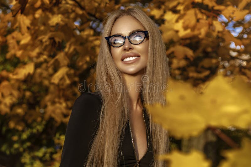 Pretty Blonde Woman with Glasses at Outdoors with Happy Expression ...