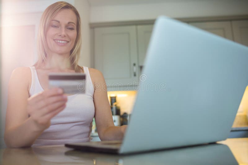 Pretty Blonde Woman Ordering Online Stock Photo - Image of computer ...